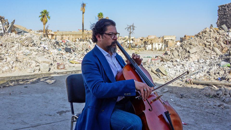 'Iraq's Rostropovich' plays near mosque where Baghdadi declared caliphate