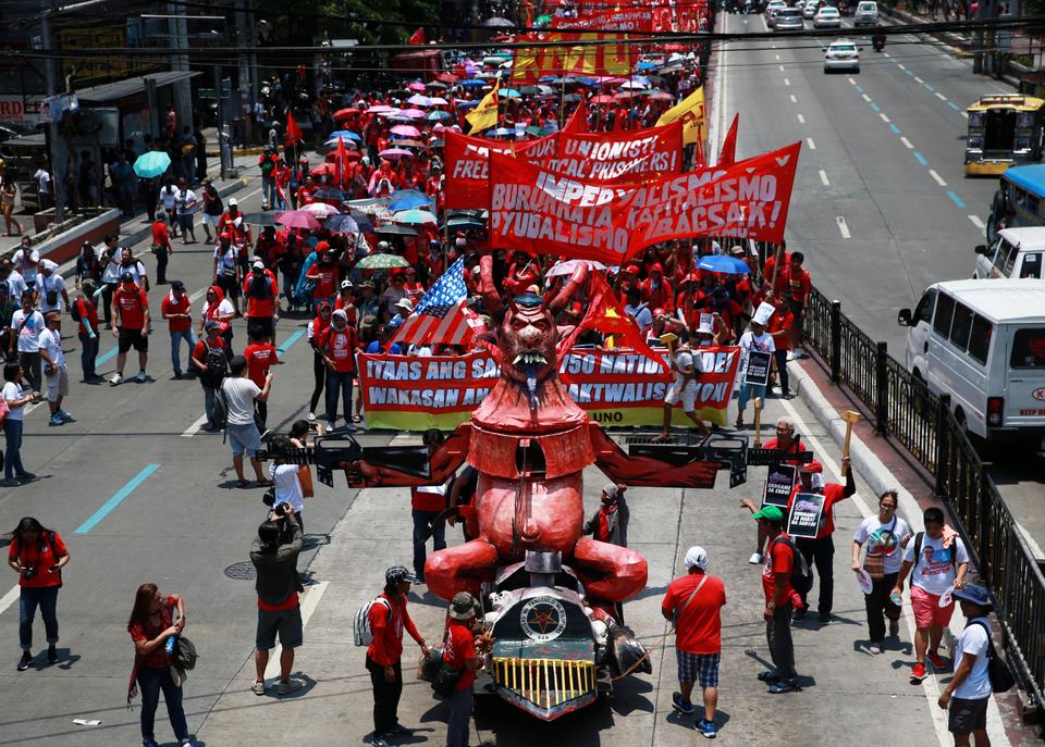 In pictures: May Day marked with protest rallies