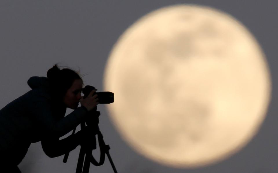 In pictures: Largest supermoon of 2020 rises on a world battling Covid-19
